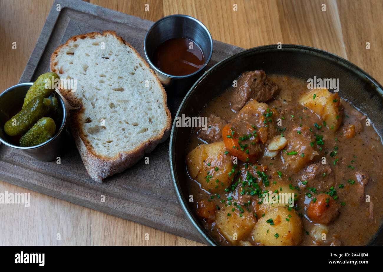Liverpool Scouse stew with bread and pickles Stock Photo - Alamy