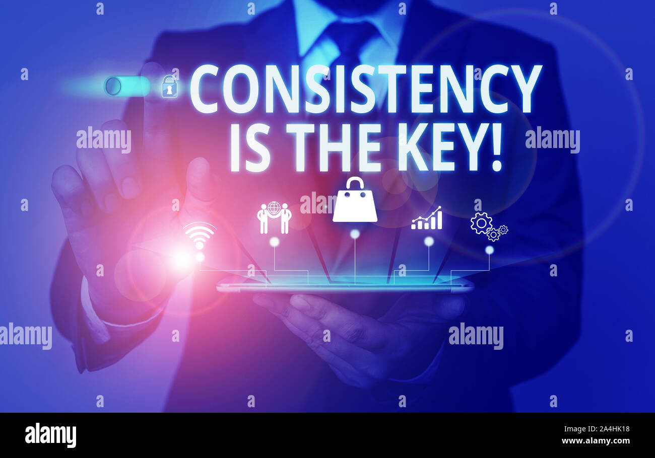 Writing note showing Consistency Is The Key. Business concept for by ...