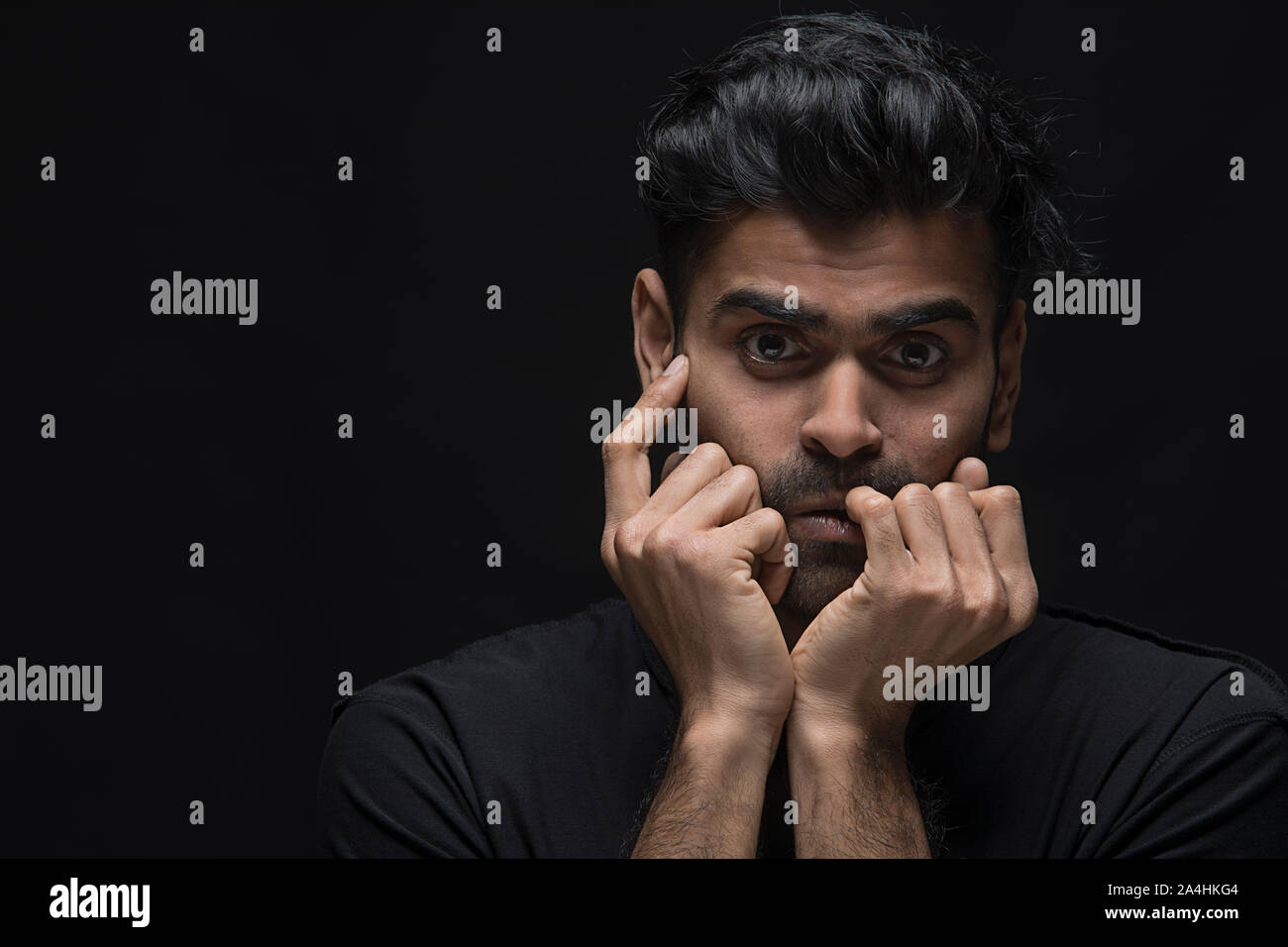 Closeup of a confused young man looking at the camera Stock Photo - Alamy