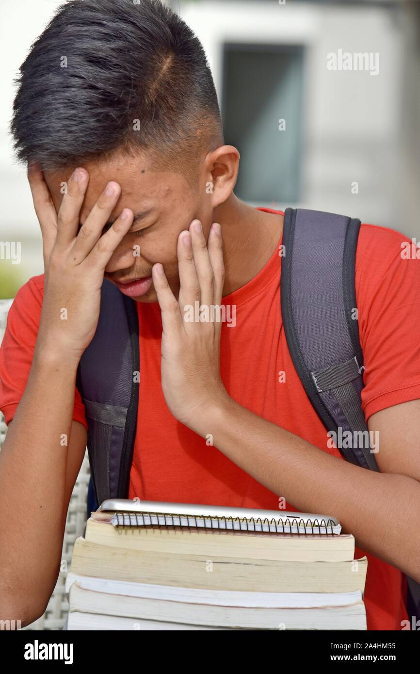 Depressed Filipino Boy Student Stock Photo - Alamy