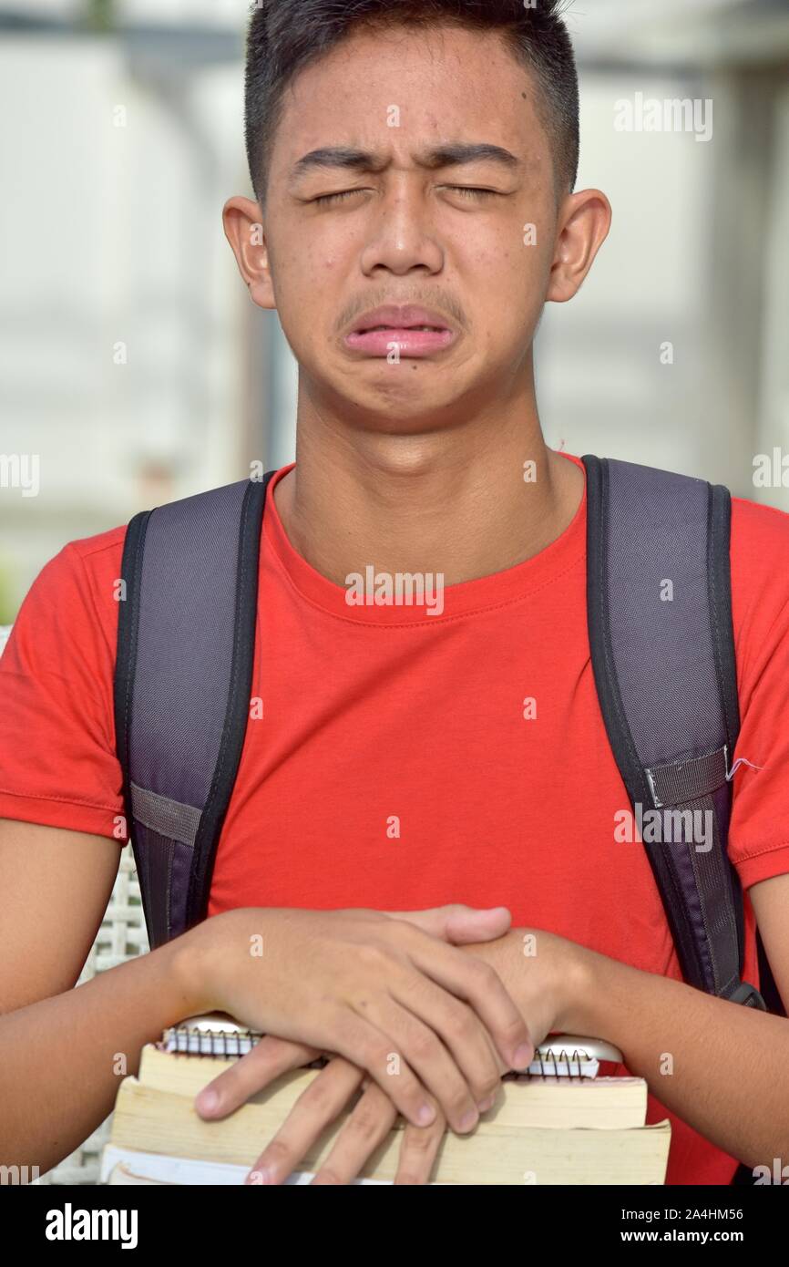 Diverse Male Student Under Stress Stock Photo - Alamy