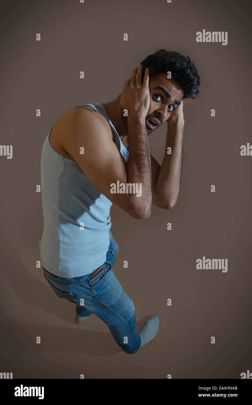 frightened young man Stock Photo - Alamy