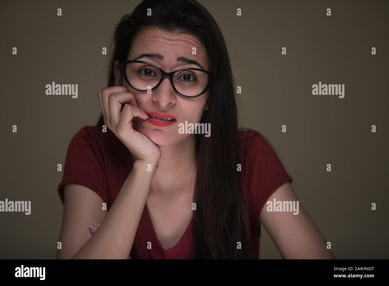 sad girl thinking at home Stock Photo - Alamy