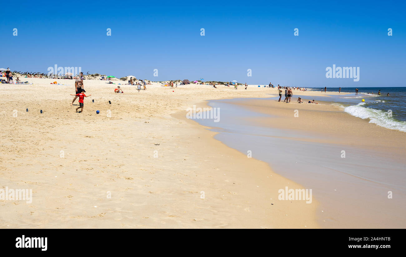 Praia do Barril is a beautiful sandy beach at Ilha de Tavira, very ...