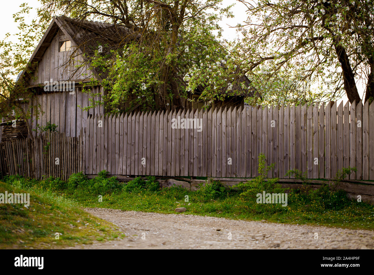 Wooden log fence Stock Photo - Alamy