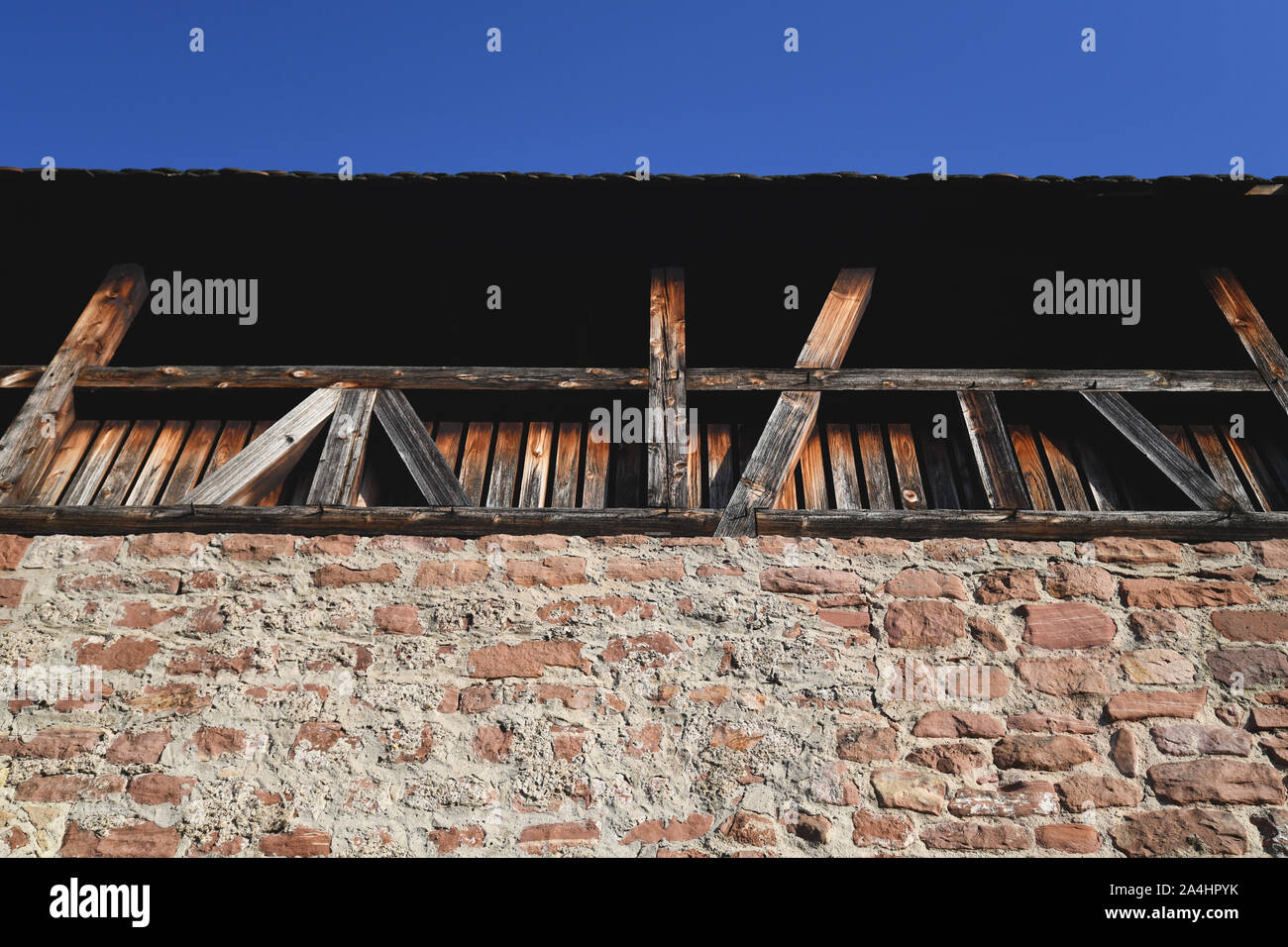 Old historic defensive city wall made of stone and timber, view from ...