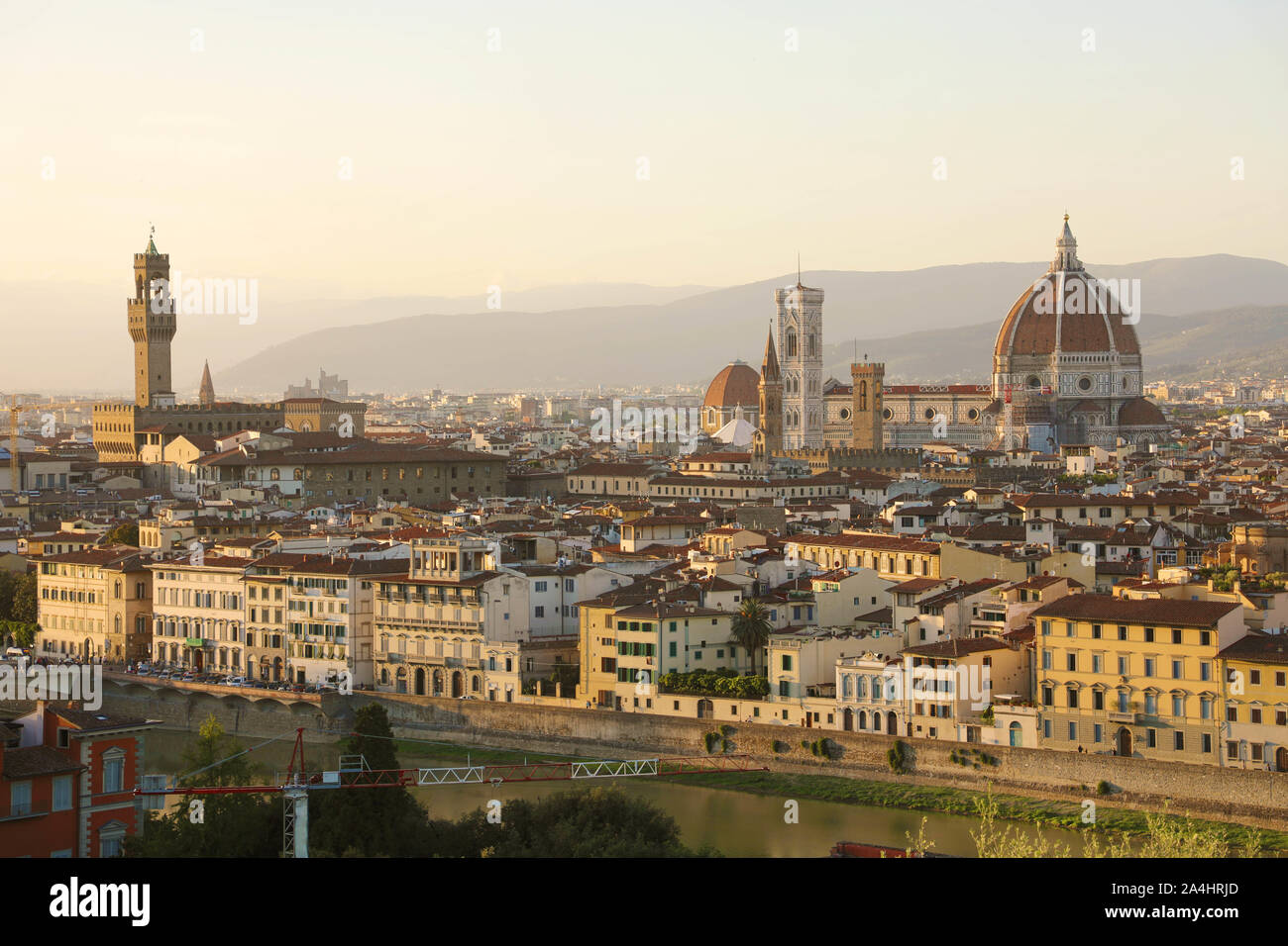 Florence city during golden sunset. Panoramic view of the river Arno ...