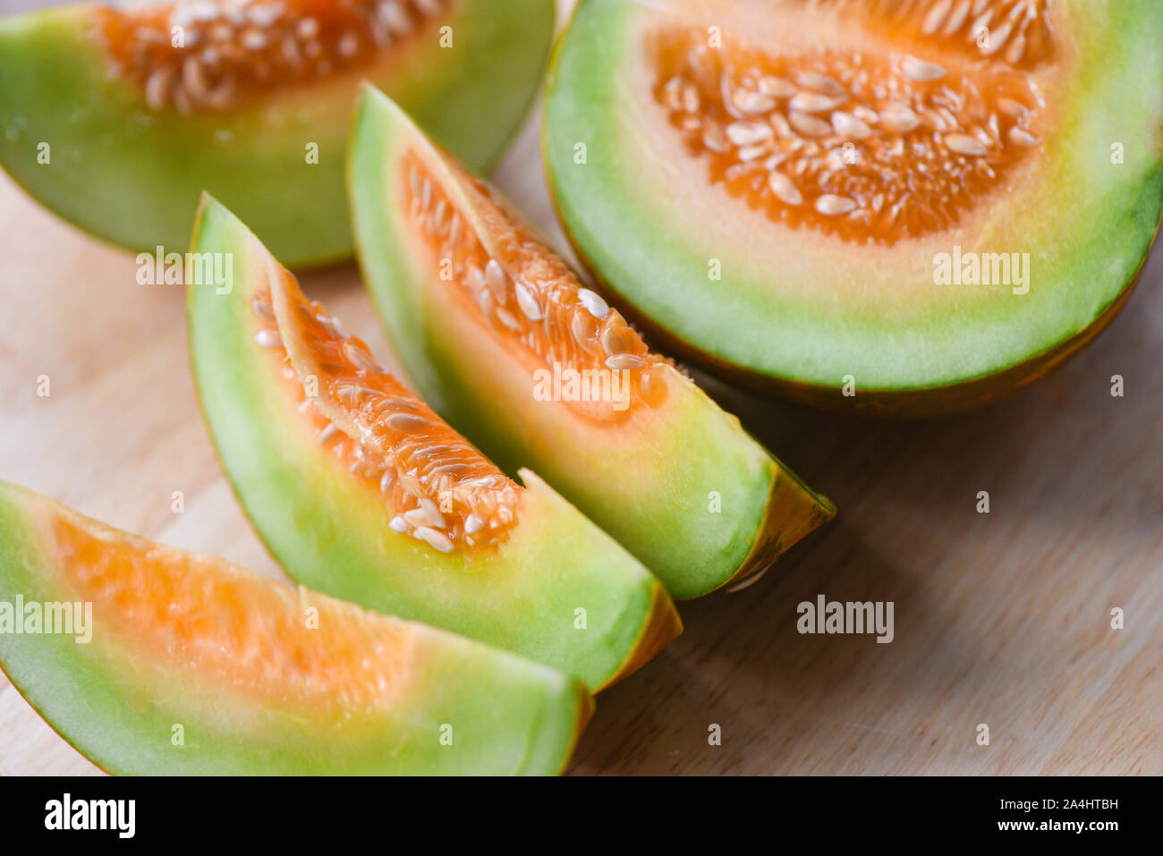 Sliced cantaloupe thai tropical fruit asian on wooden background / Cantaloupe Melon Muskmelon ...