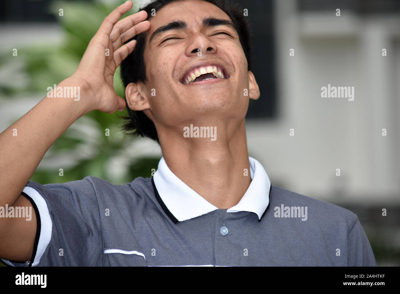 Young Filipino Male And Laughter Stock Photo - Alamy