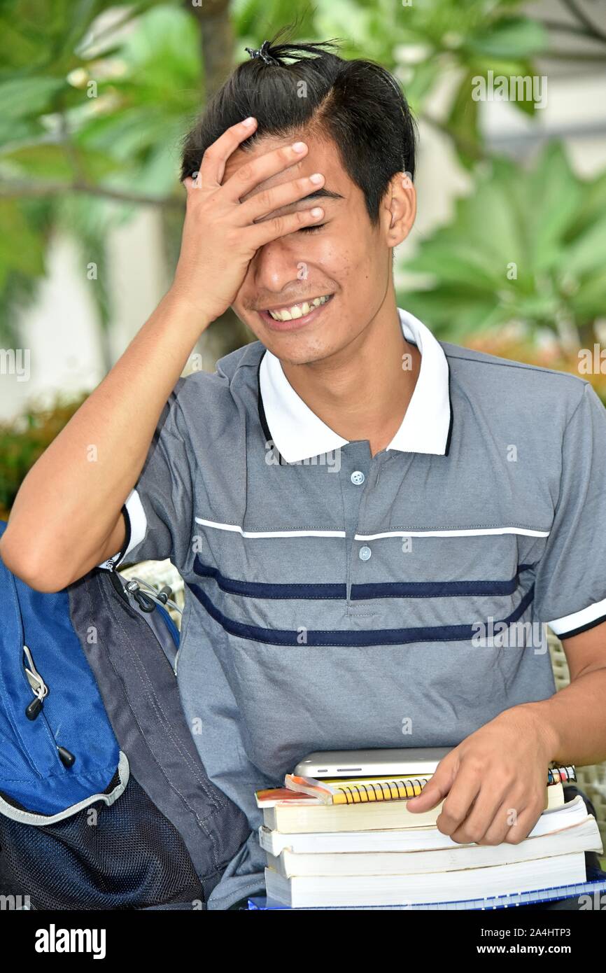 Laughing male student writing hi-res stock photography and images - Alamy