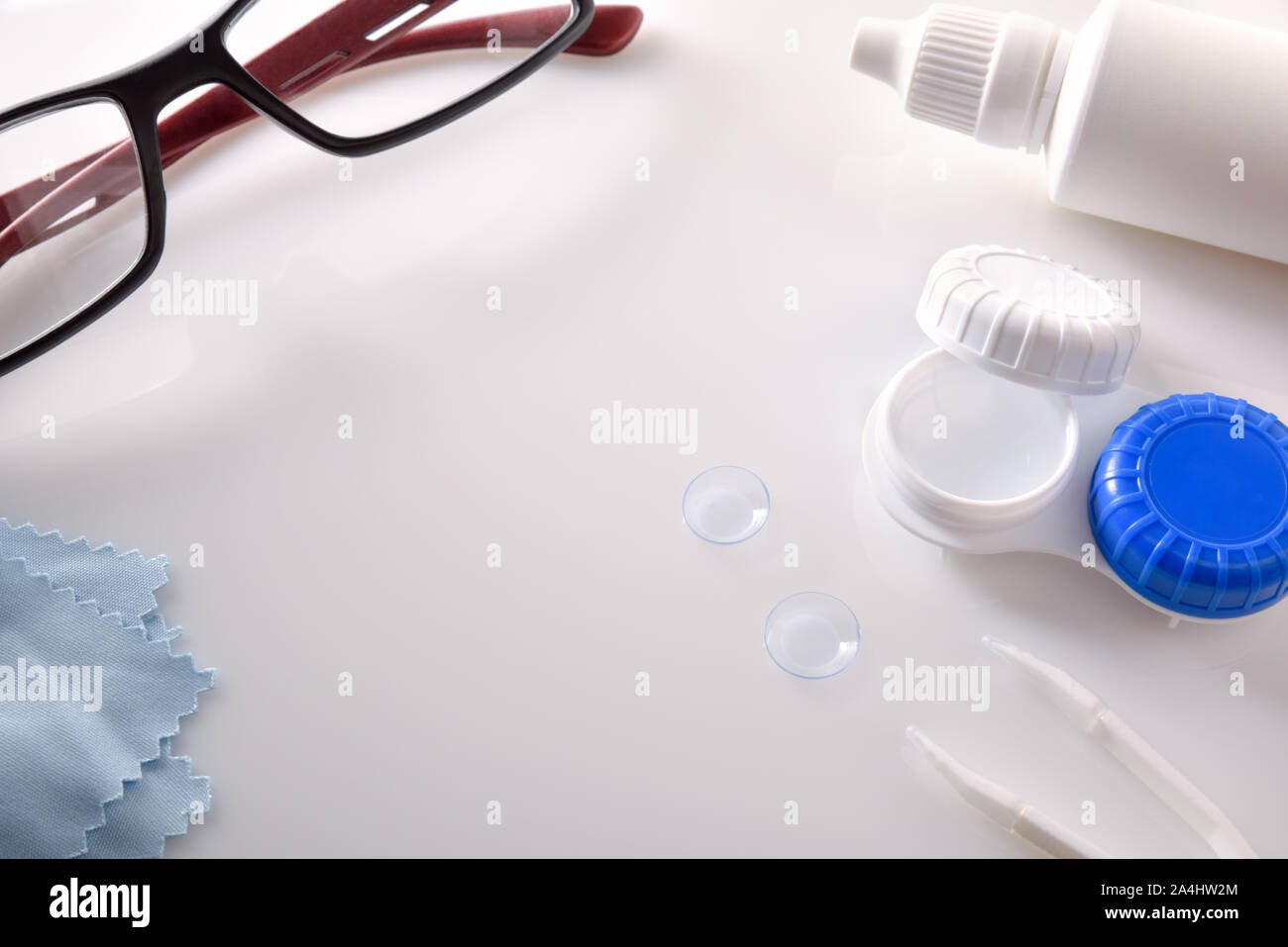 Various elements for vision correction on white table. Horizontal ...