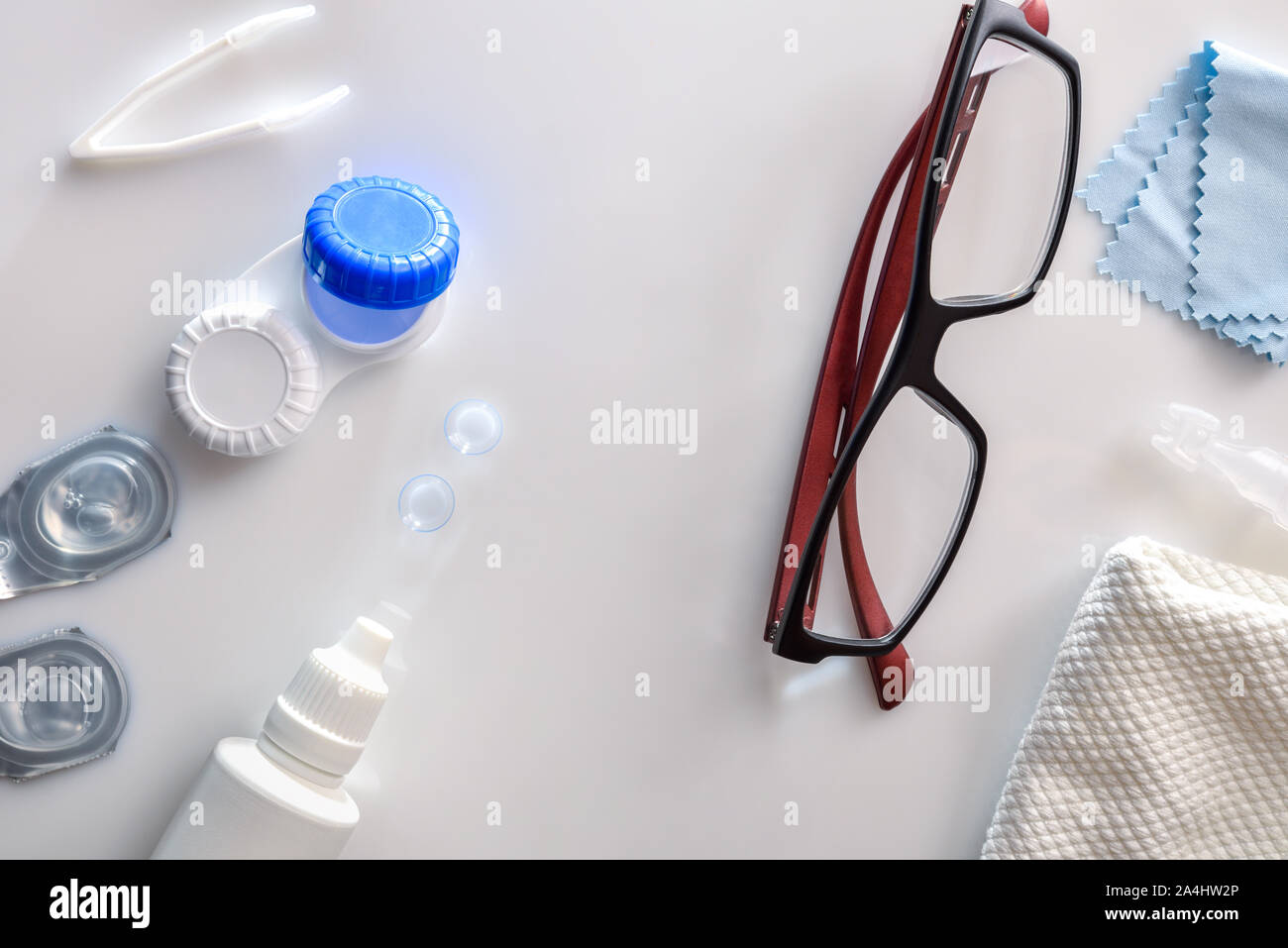 Various elements for vision correction on white table. Horizontal ...