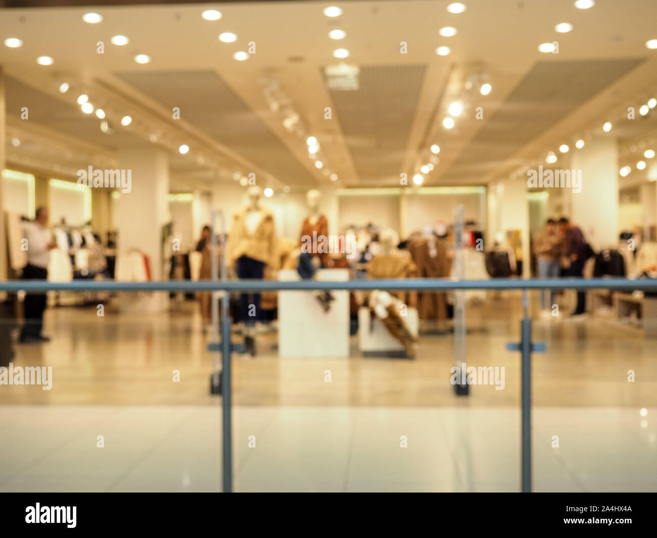 Blurred clothes shop background. Abstract blurred of fashion clothes ...