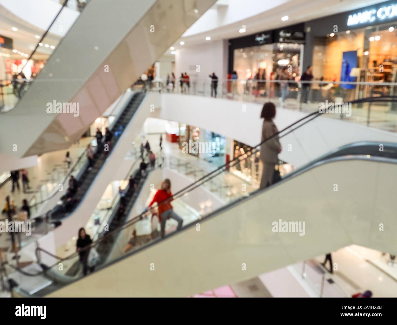 shopping Mall escalator blurred. Blurred motion demonstrates the speed ...