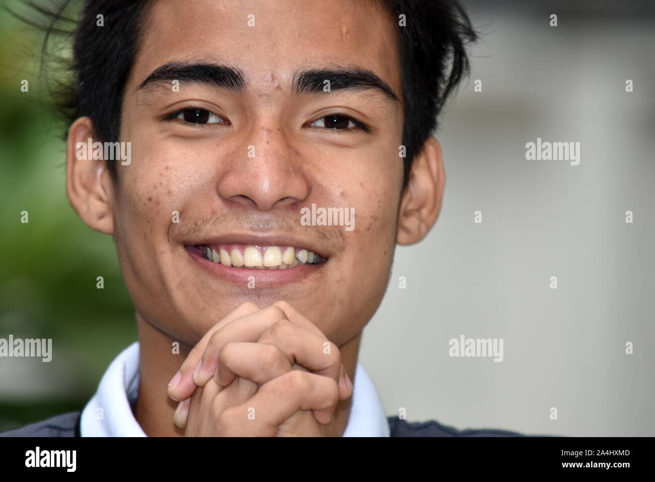 Minority Male Praying Stock Photo - Alamy