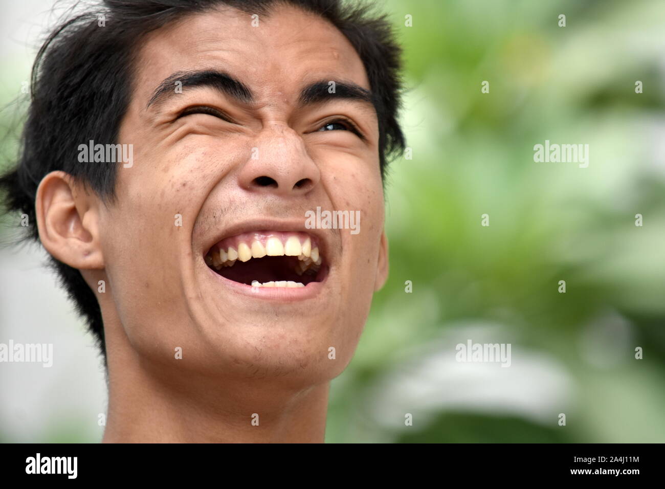 Filipino Man And Laughter Stock Photo - Alamy