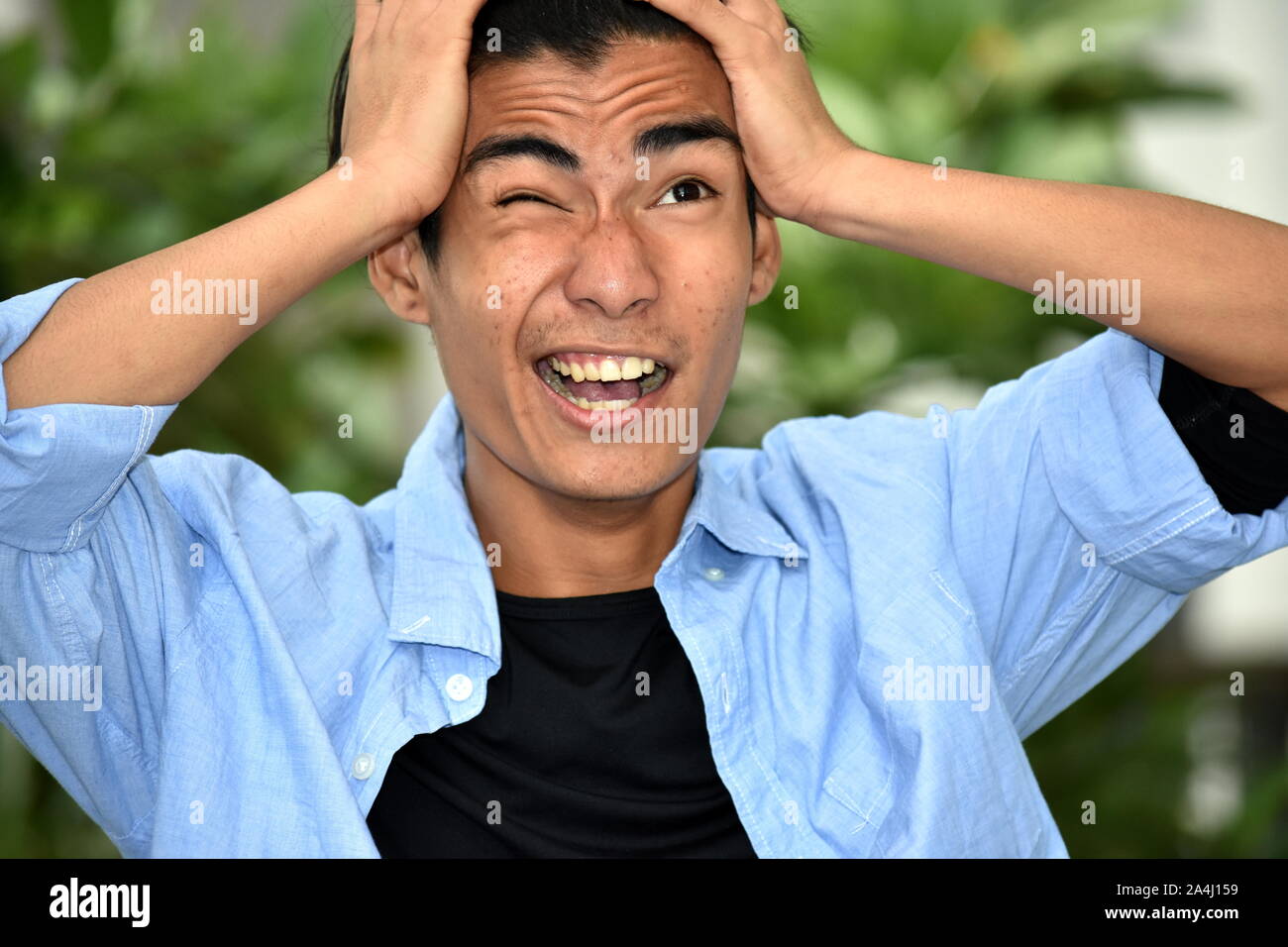 Confused Asian Male Person Stock Photo - Alamy