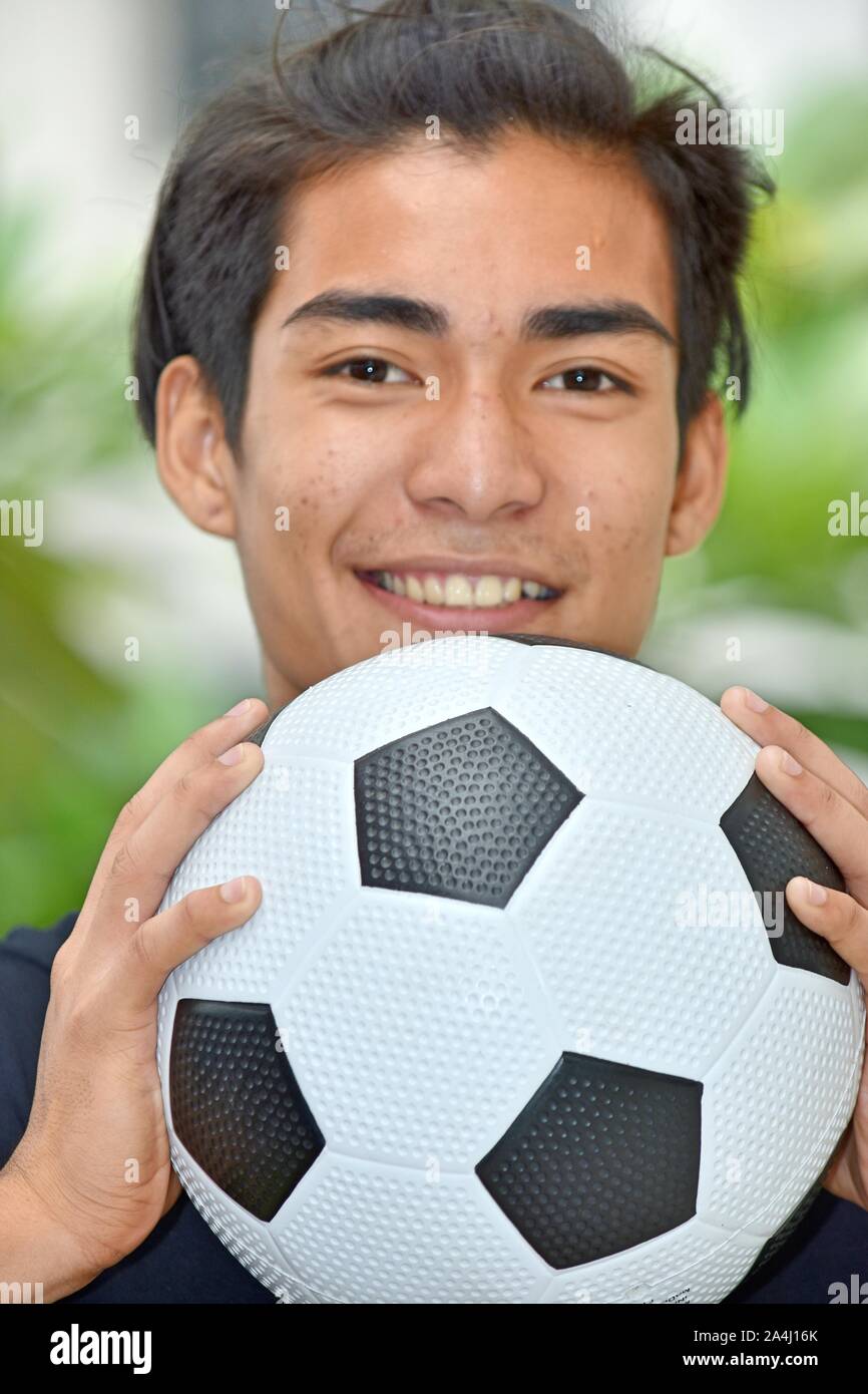 Soccer player with soccer ball hi-res stock photography and images - Alamy