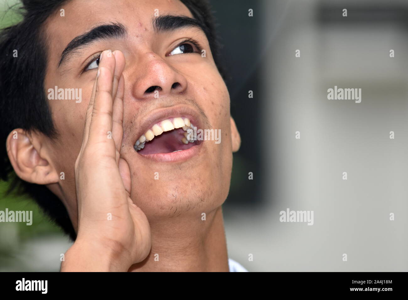 An Asian Male Talking Stock Photo - Alamy