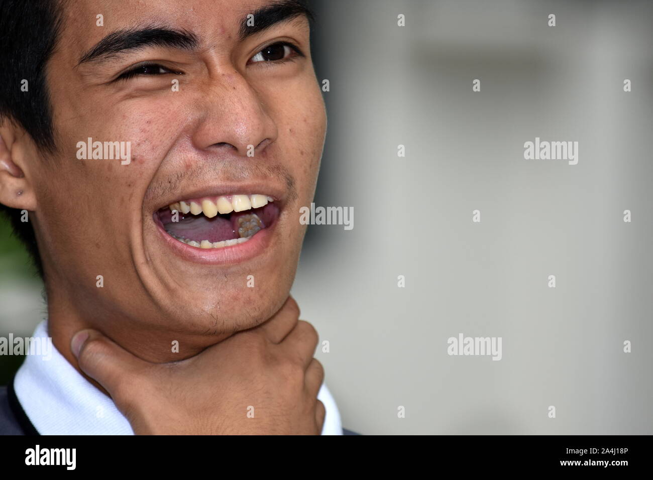 Choking Handsome Minority Male Stock Photo - Alamy