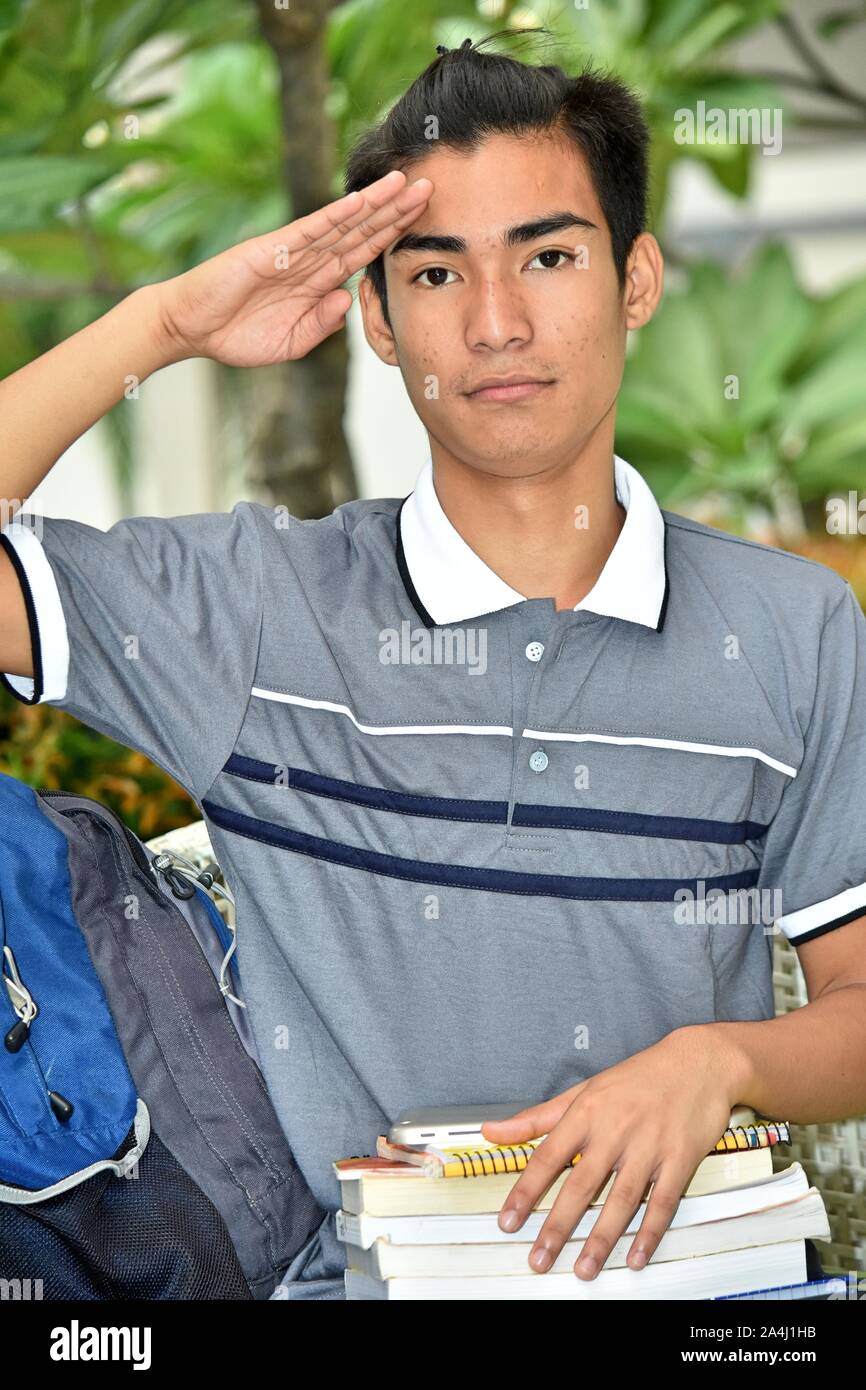 An Asian Boy Student Saluting Stock Photo - Alamy