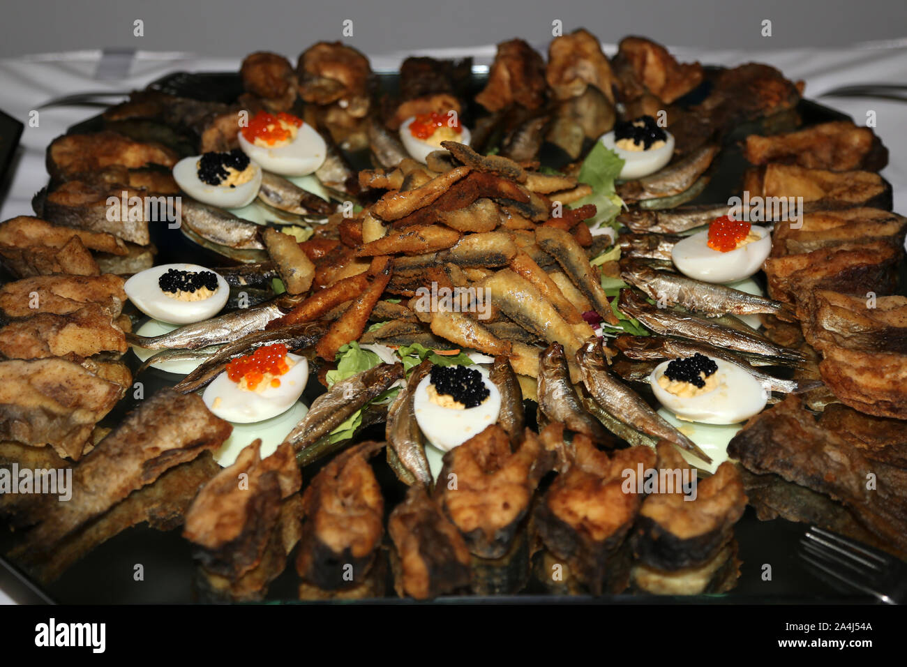 Fish Dishes - Cold fish and seafood snacks Stock Photo - Alamy