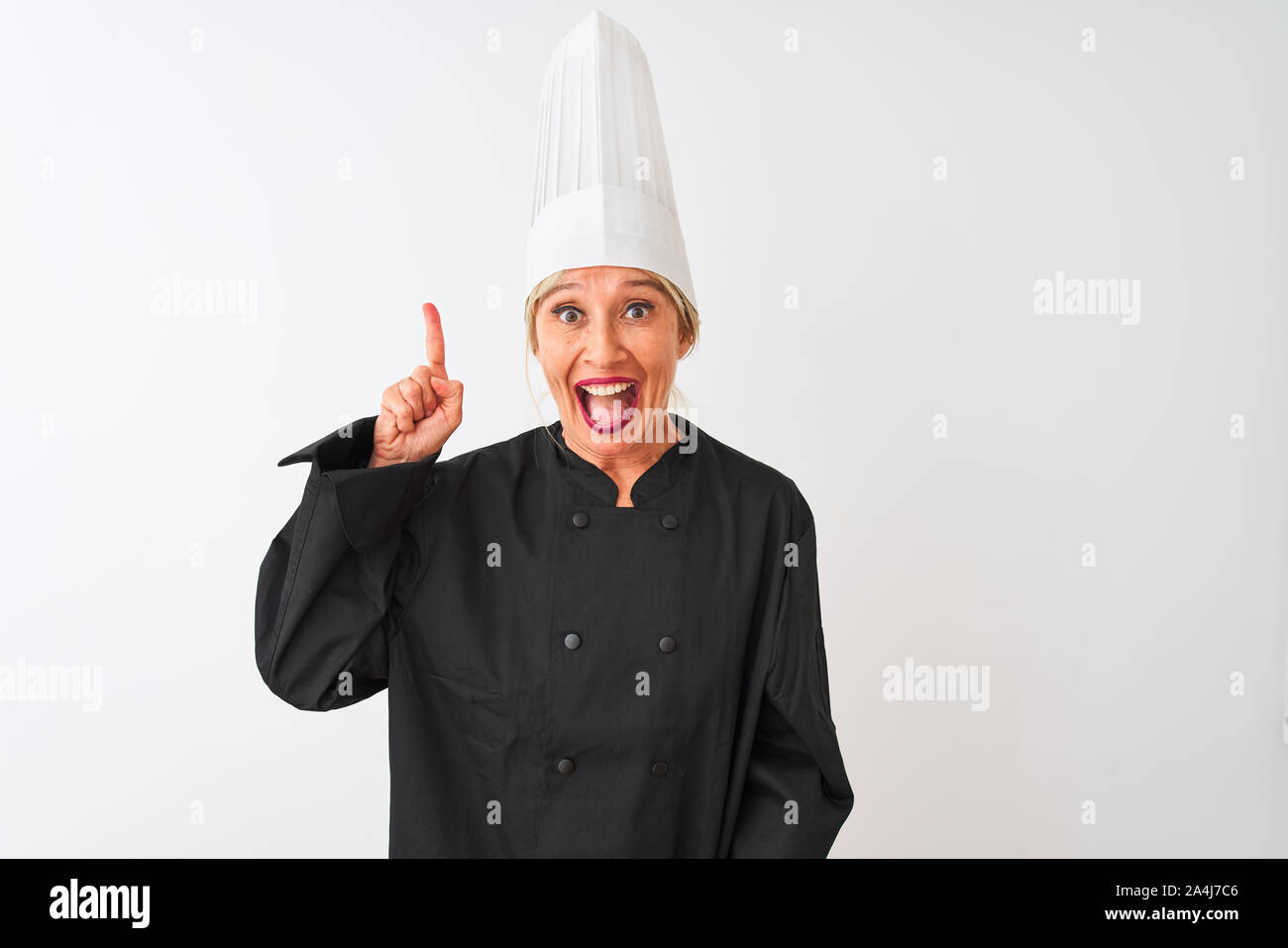 Middle age chef woman wearing uniform and hat standing over isolated ...