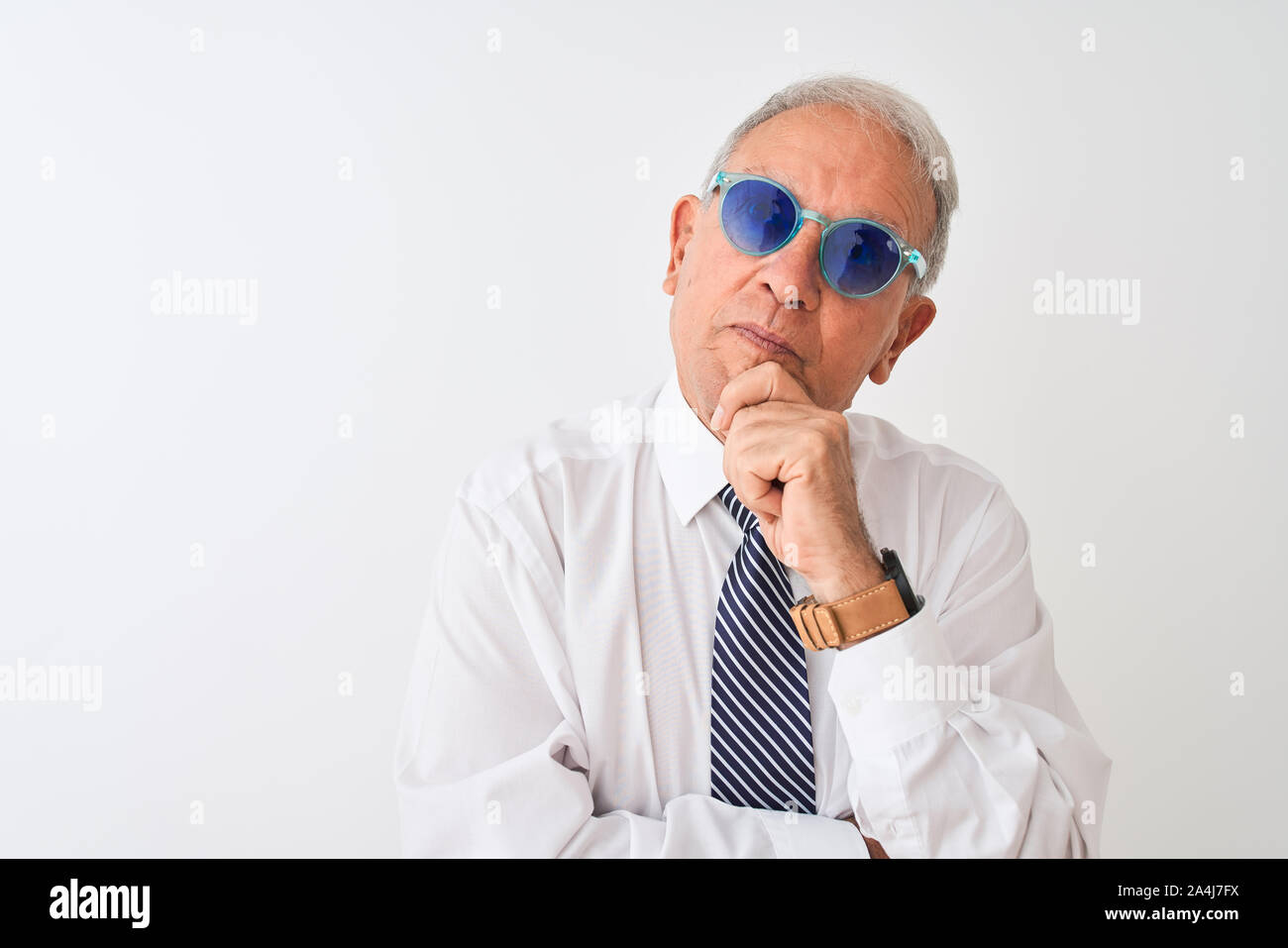 Senior grey-haired businessman wearing tie and sunglasses over isolated ...