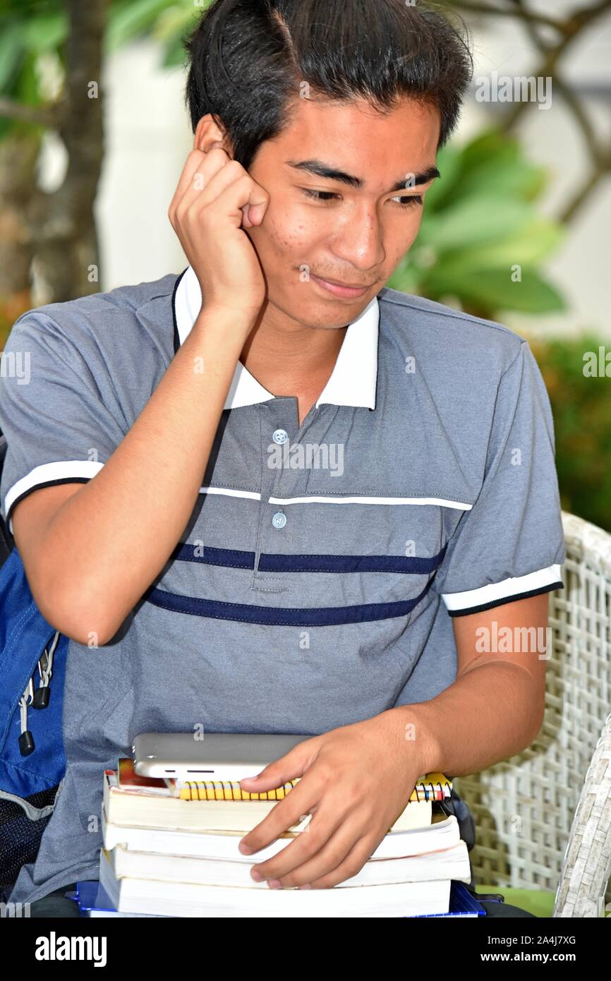 Youthful Asian Male Student Thinking Stock Photo - Alamy