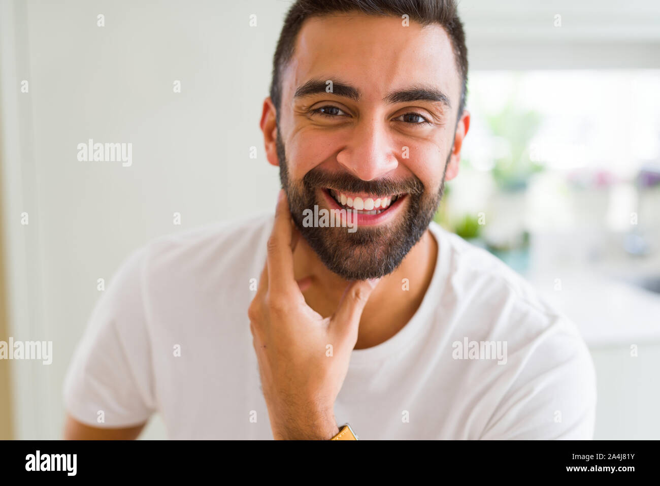 Handsome man smiling cheerful with a big smile on face showing teeth ...