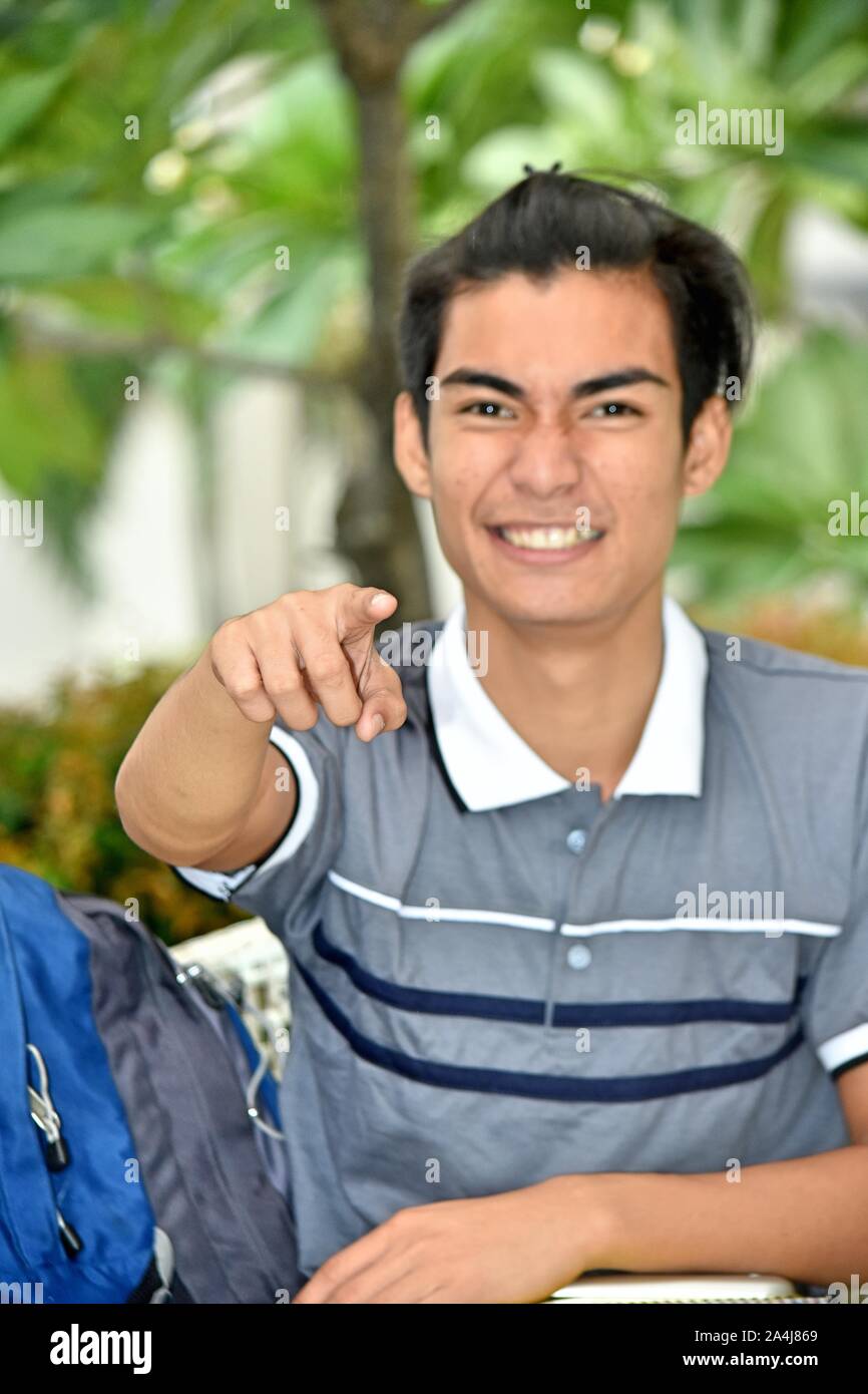 Male student pointing school hi-res stock photography and images - Alamy