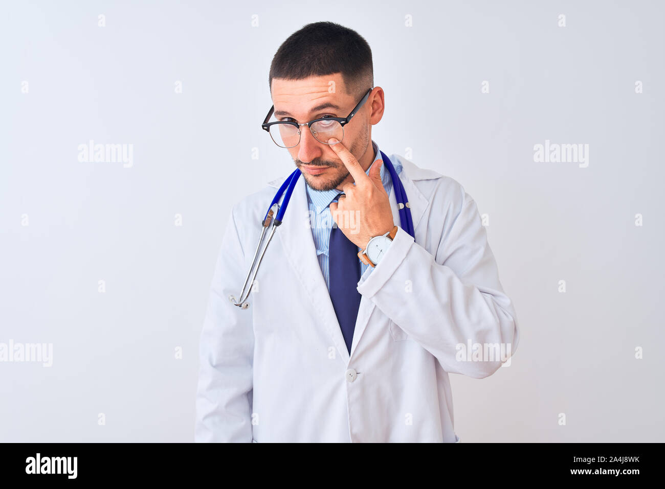 Young doctor man wearing stethoscope over isolated background Pointing ...