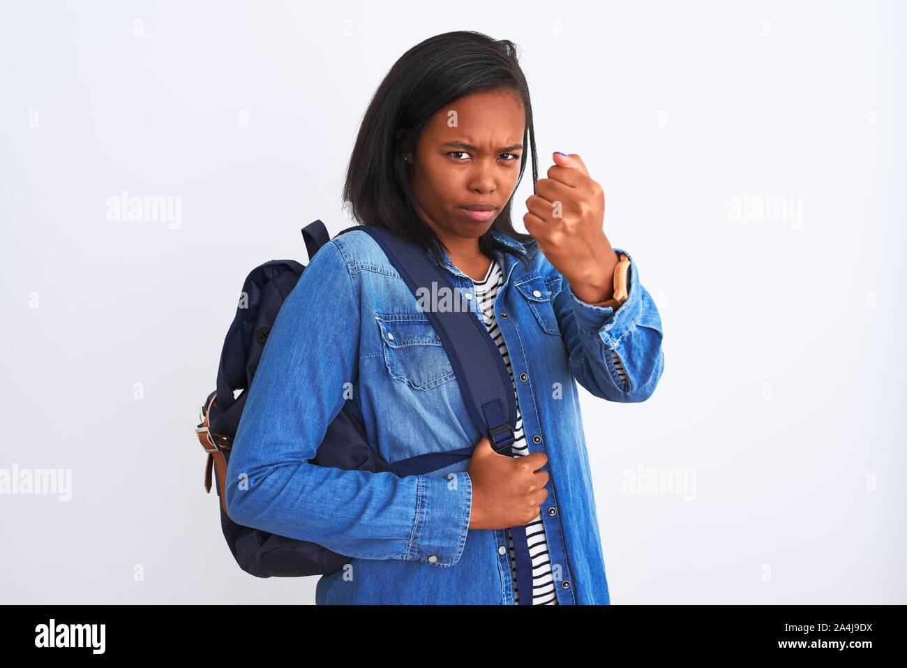Young african american student woman wearing backpack over isolated ...