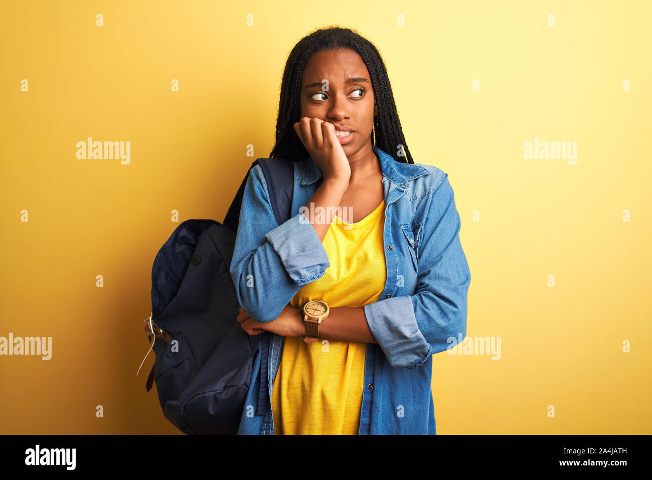 African american student woman wearing backpack standing over isolated ...