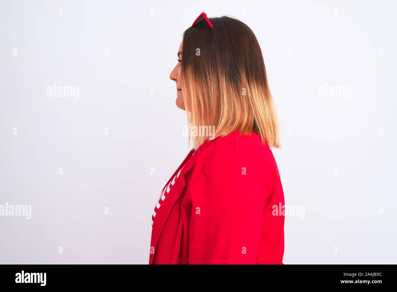 Young beautiful woman wearing striped t-shirt and jacket over isolated ...
