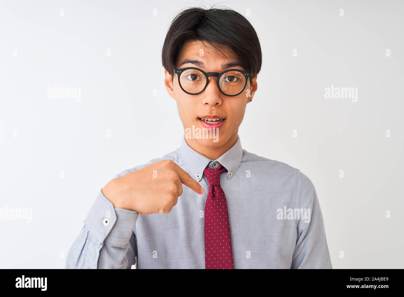 Chinese businessman wearing tie and glasses standing over isolated ...