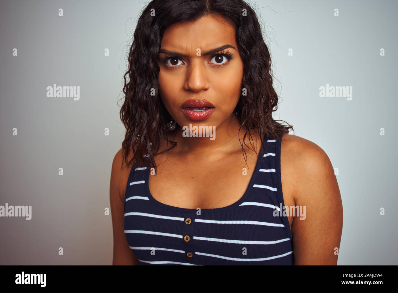 Beautiful transsexual transgender woman wearing striped t-shirt over ...
