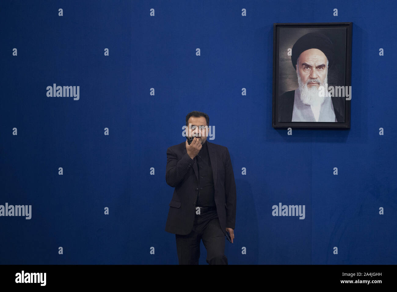 October 14, 2019, Tehran, Iran: Officials stand under the portrait of ...