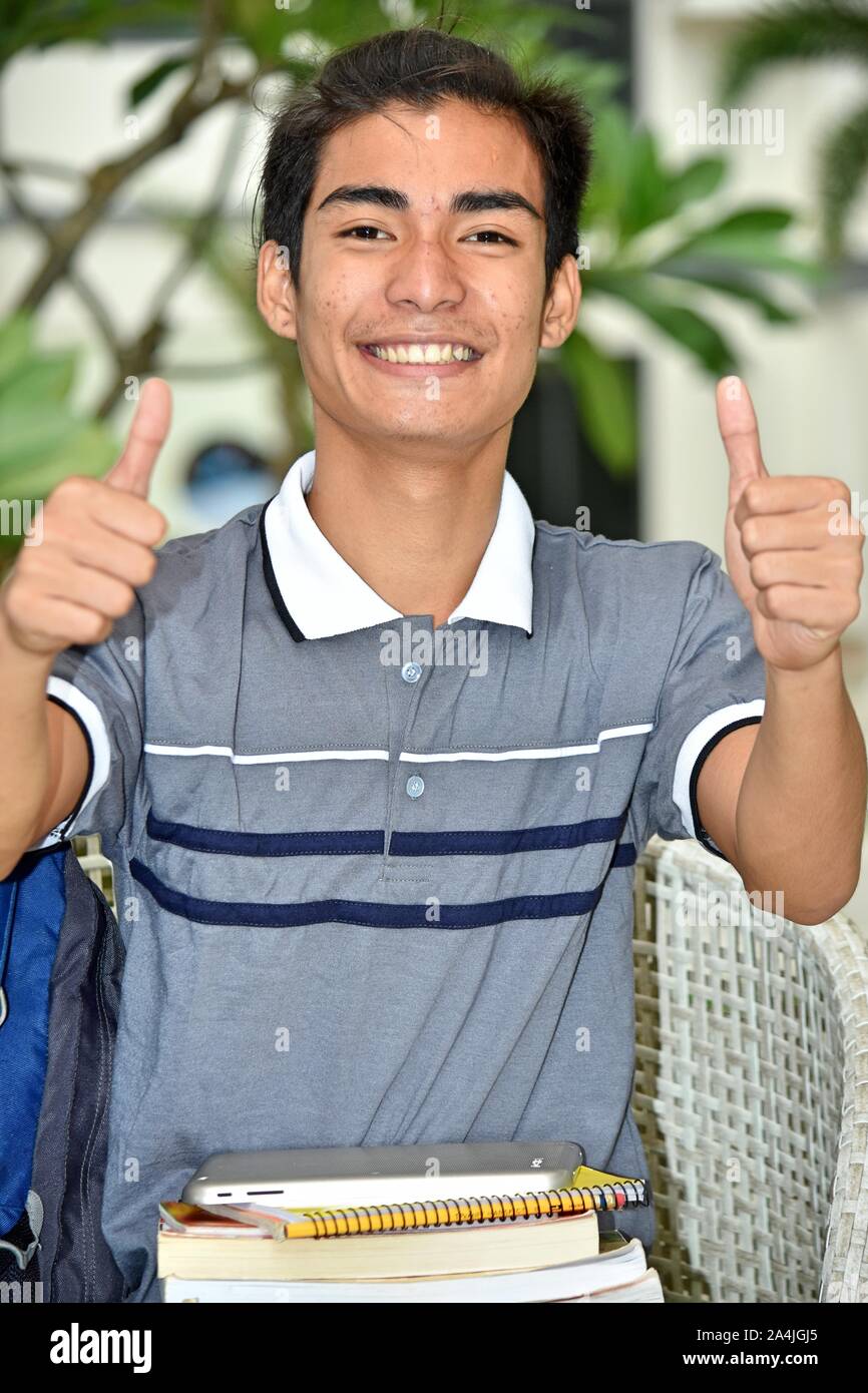 Boy Student With Thumbs Up Stock Photo - Alamy