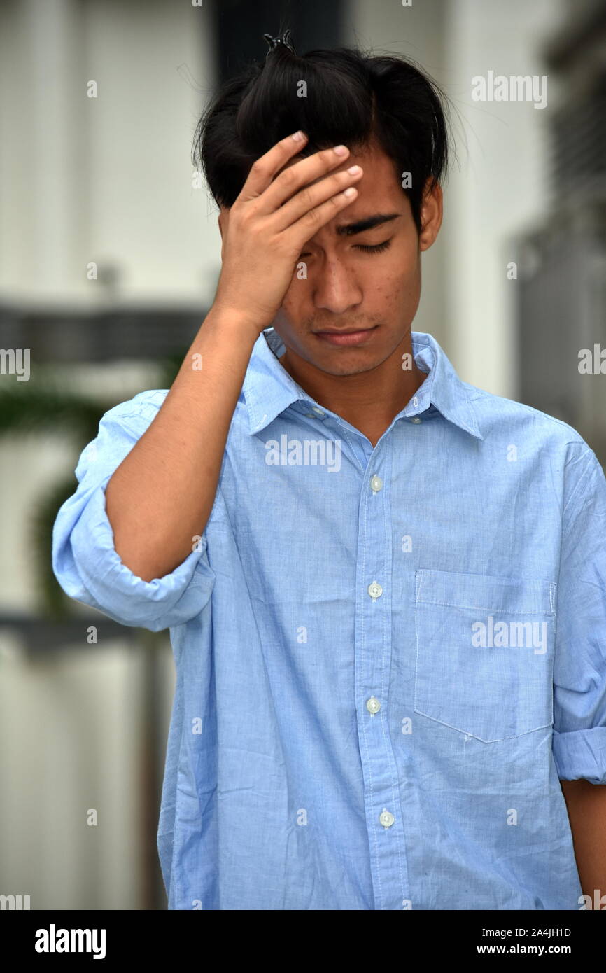 An Unhappy Filipino Person Stock Photo - Alamy