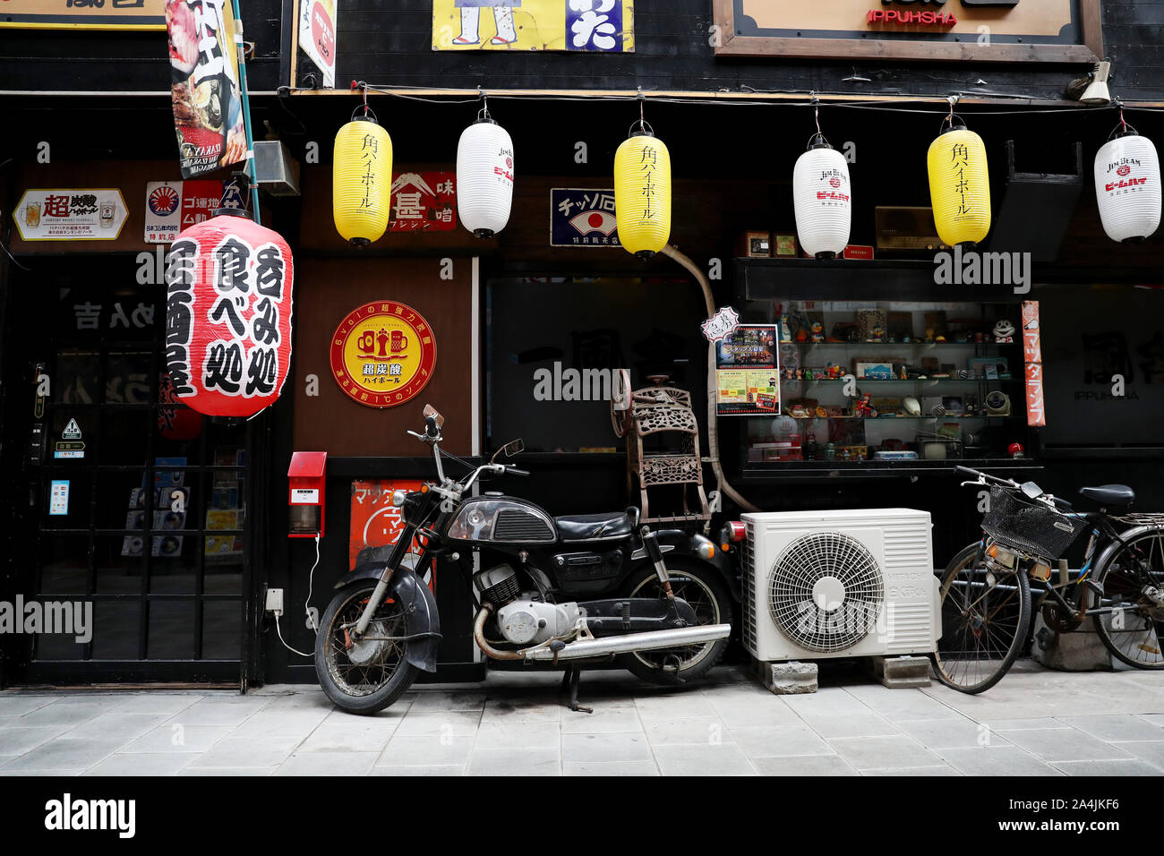 A motorcycle outside a bar in Beppu, Oita, Japan Stock Photo - Alamy