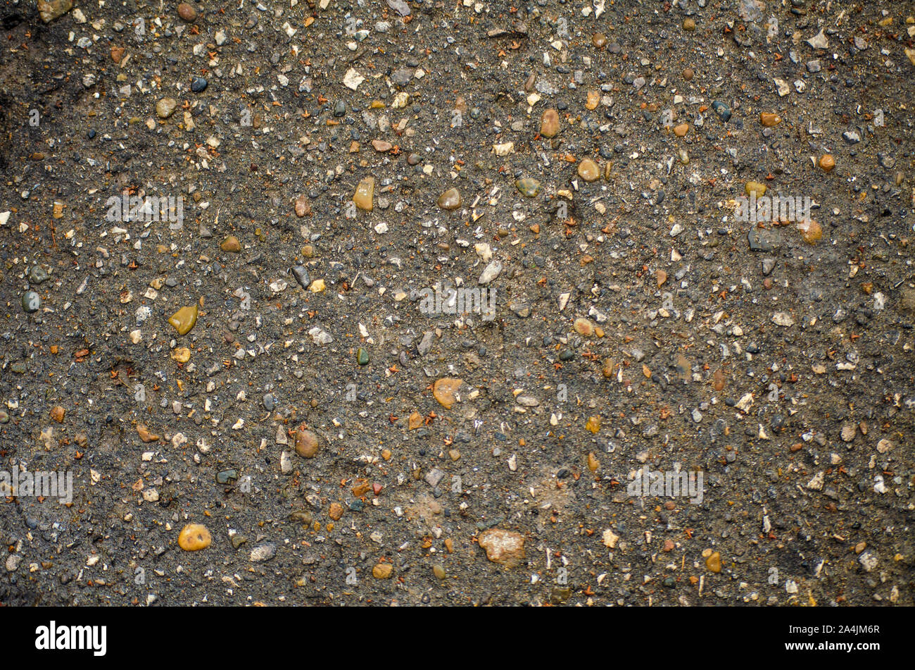 Texture of dry gray asphalt with pebbles and small stones. Concept of ...