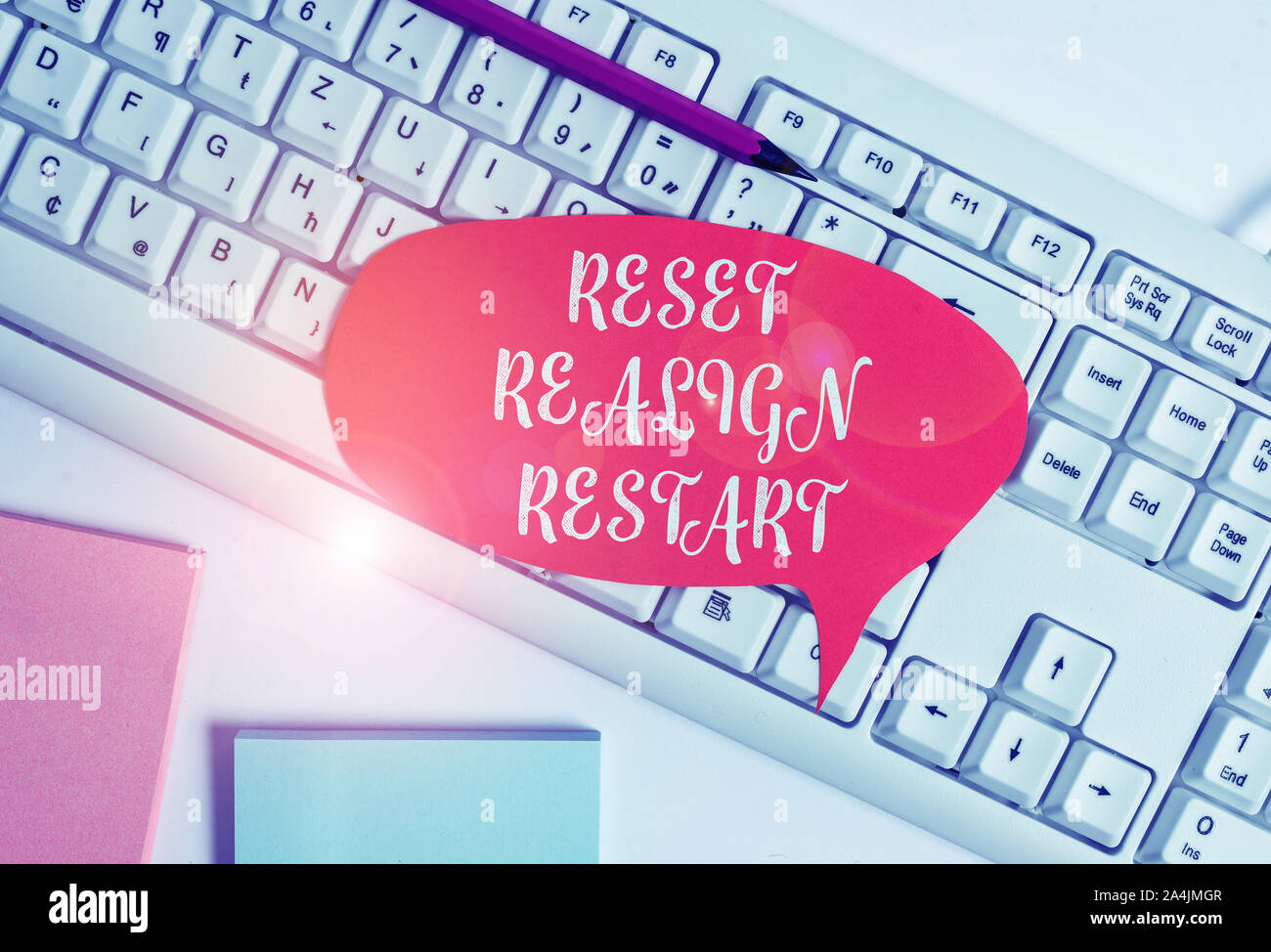 Writing note showing Reset Realign Restart. Business concept for Life ...