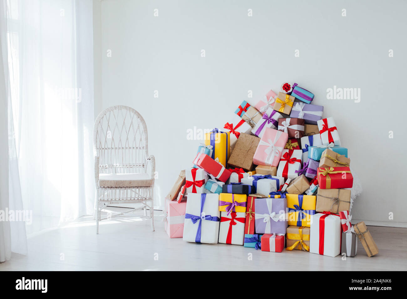 Child a lot of gifts hi-res stock photography and images - Alamy