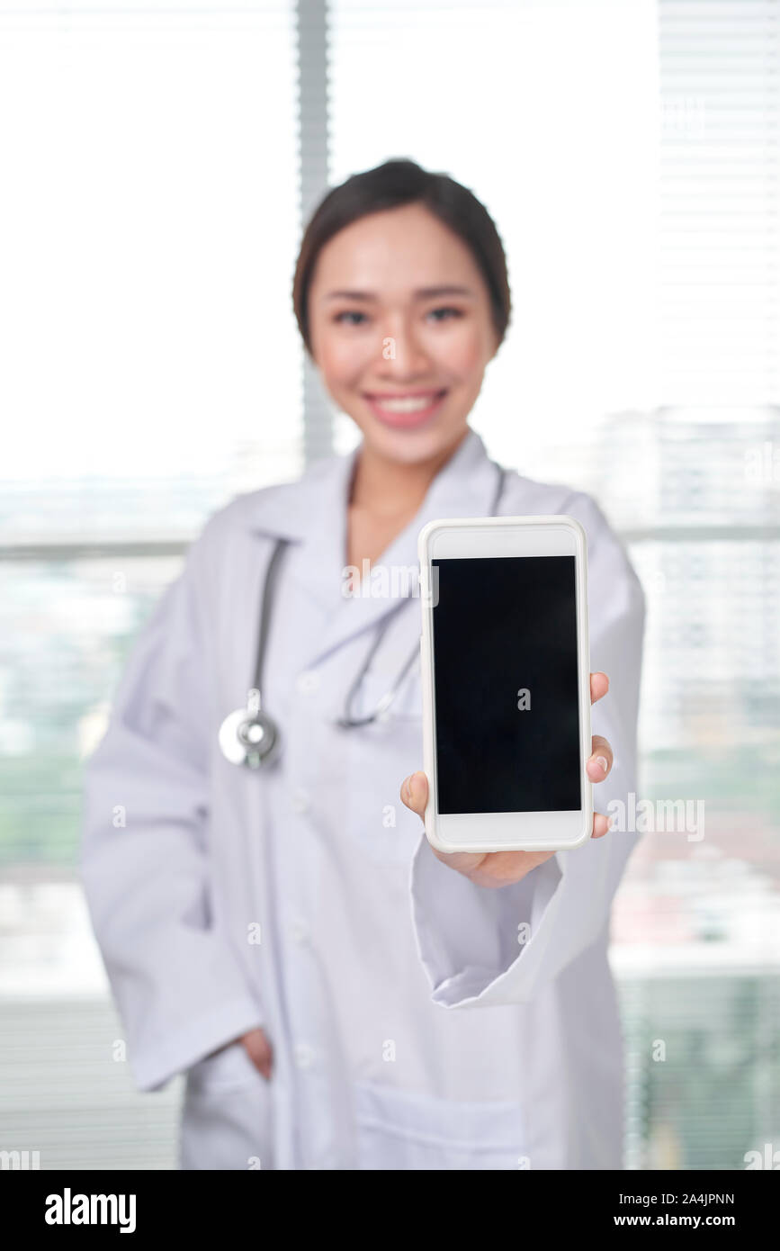 Female doctor smartphone showing hi-res stock photography and images ...
