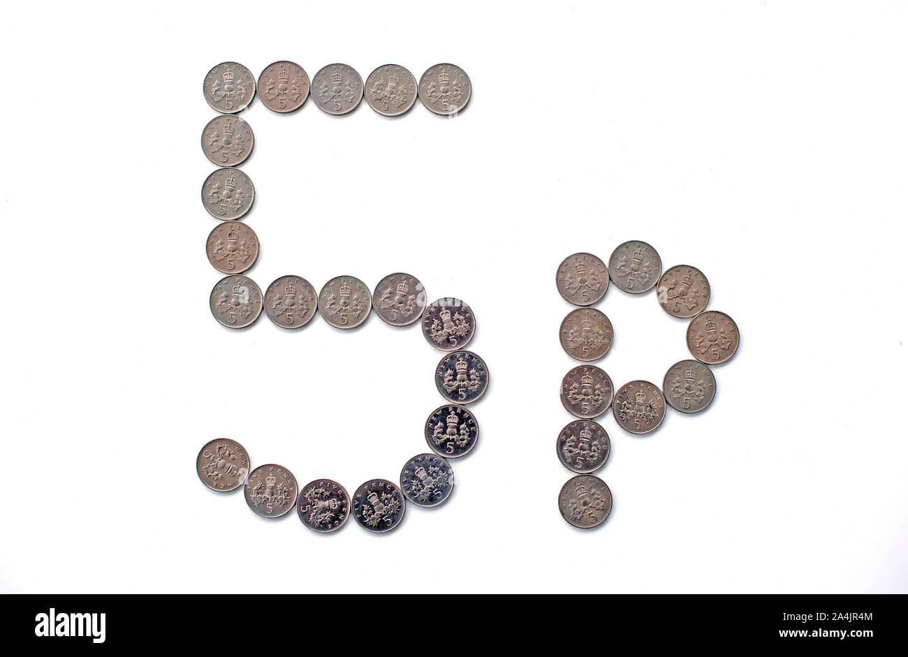 Old UK five pence coins Stock Photo - Alamy