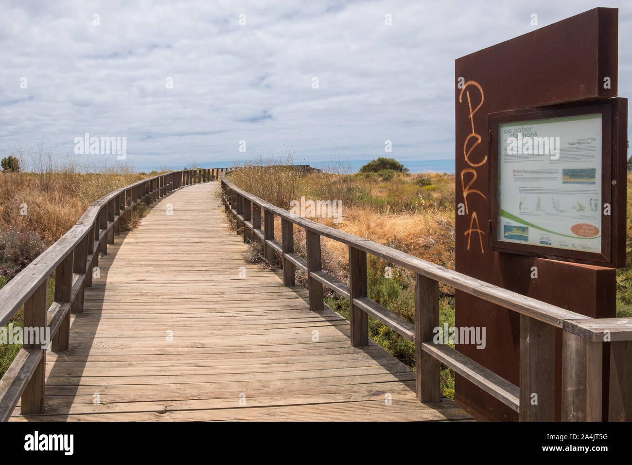 Boardwalk running through the wetlands and nature reserve at the Alvor ...
