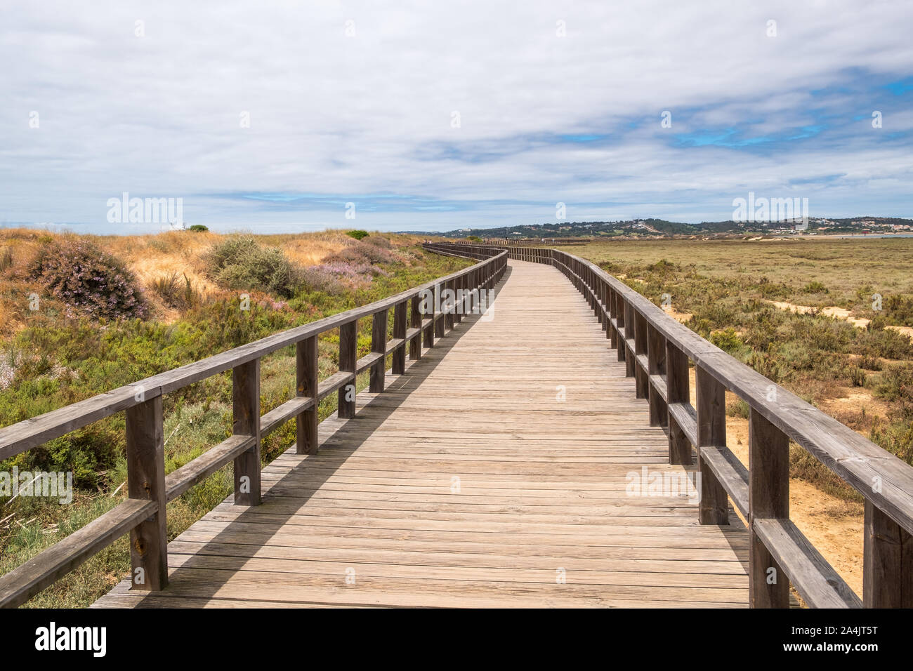 Boardwalk running through the wetlands and nature reserve at the Alvor ...