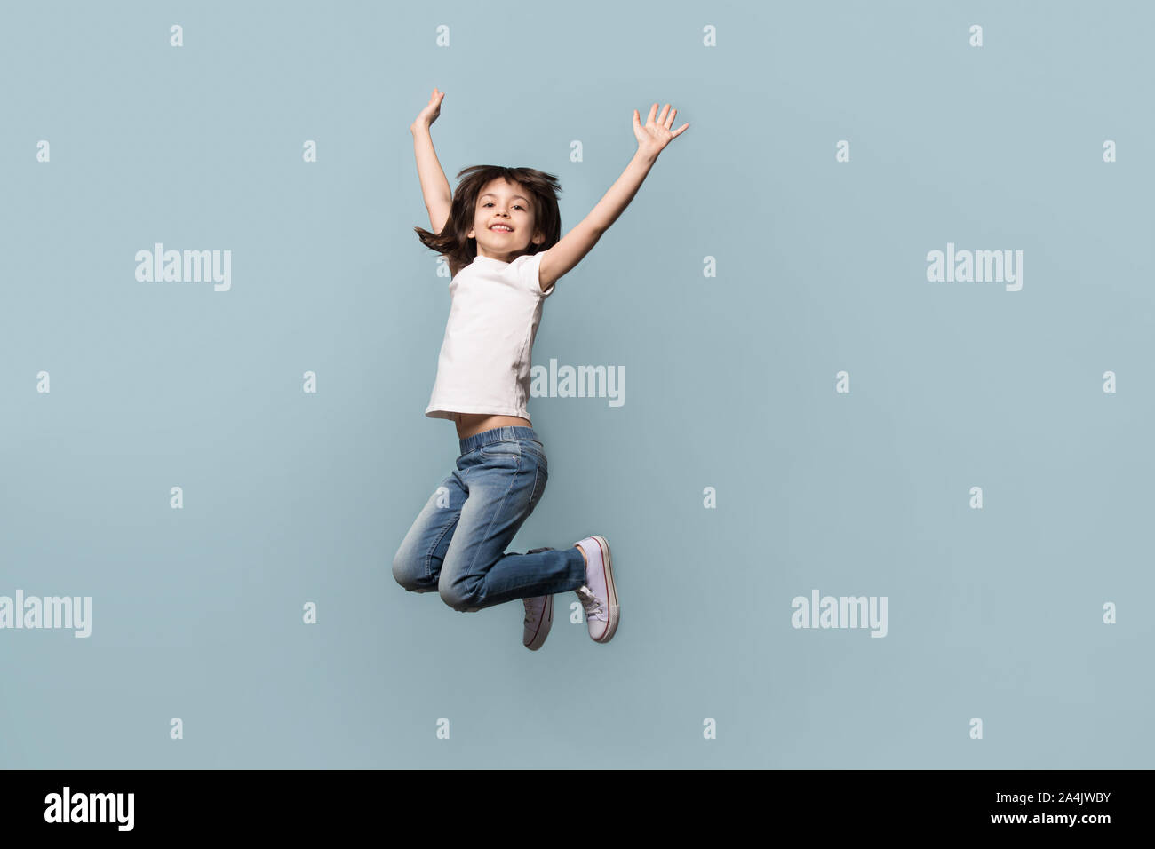 Girl jumping high hi-res stock photography and images - Alamy