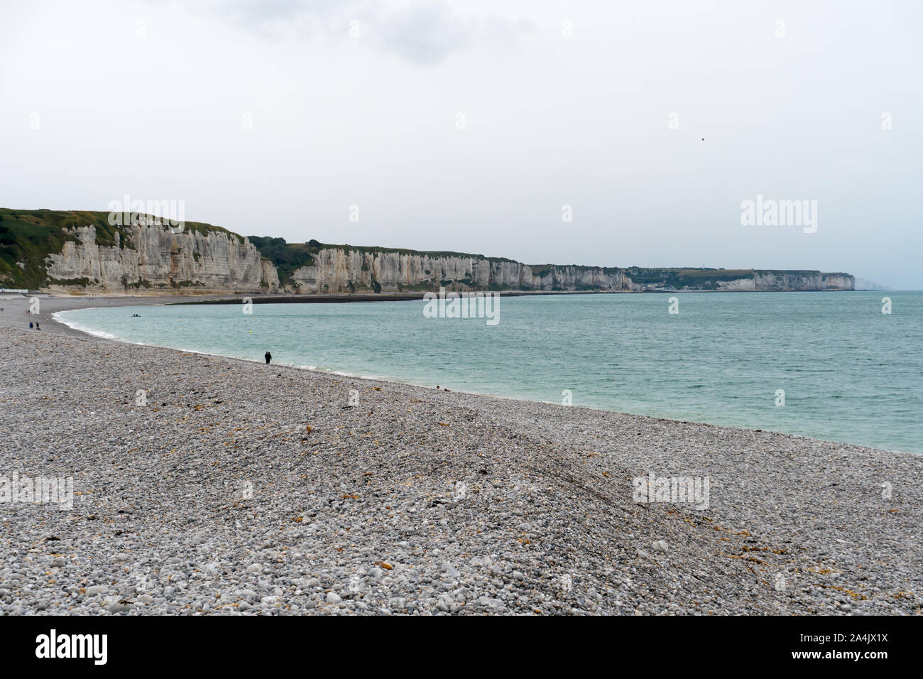 View of the rocky beach and limestone cliffs on the alabaster coast of ...